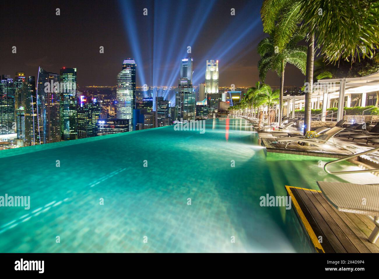 Singapore. Composite of infinity pool atop the Marina Bay Sands Hotel ...