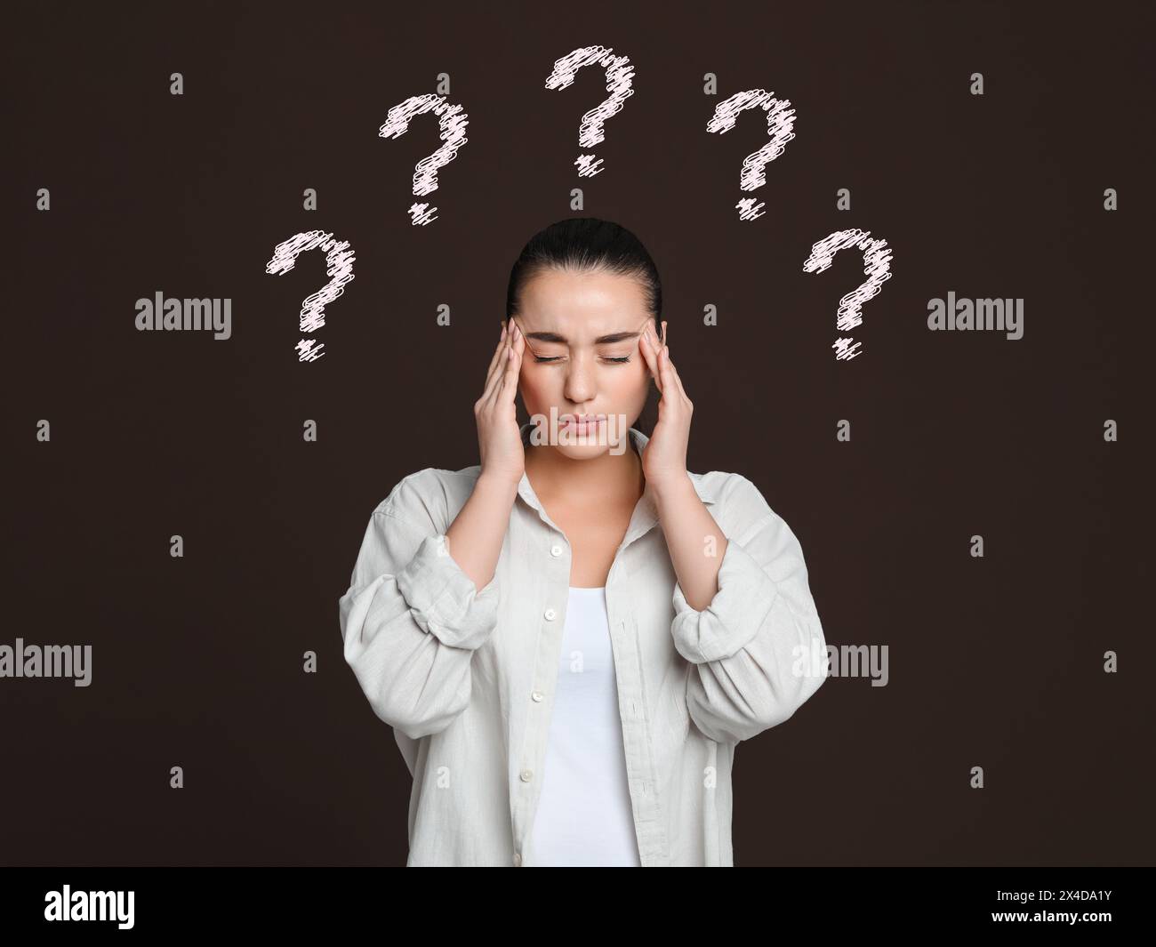 Amnesia Confused Young Woman And Question Marks On Brown Background
