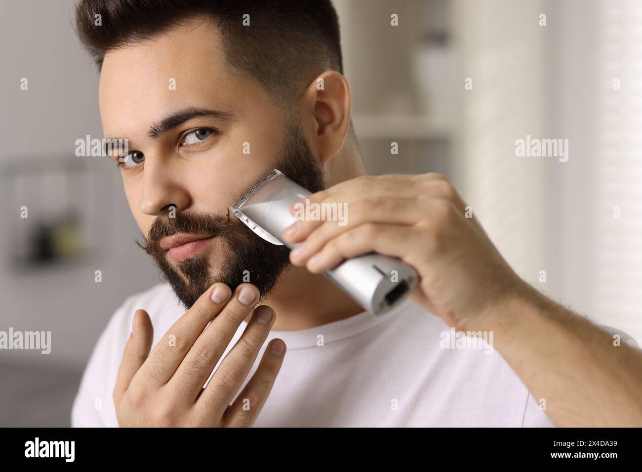 Male shaving trimming beard hi-res stock photography and images - Alamy