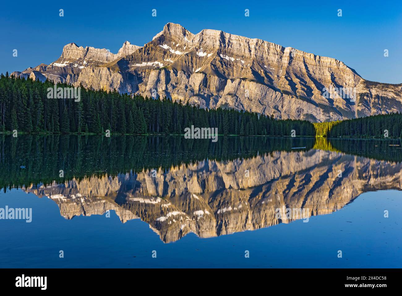 Canada, Alberta, Banff National Park. Mt. Rundle reflected in Two Jack ...
