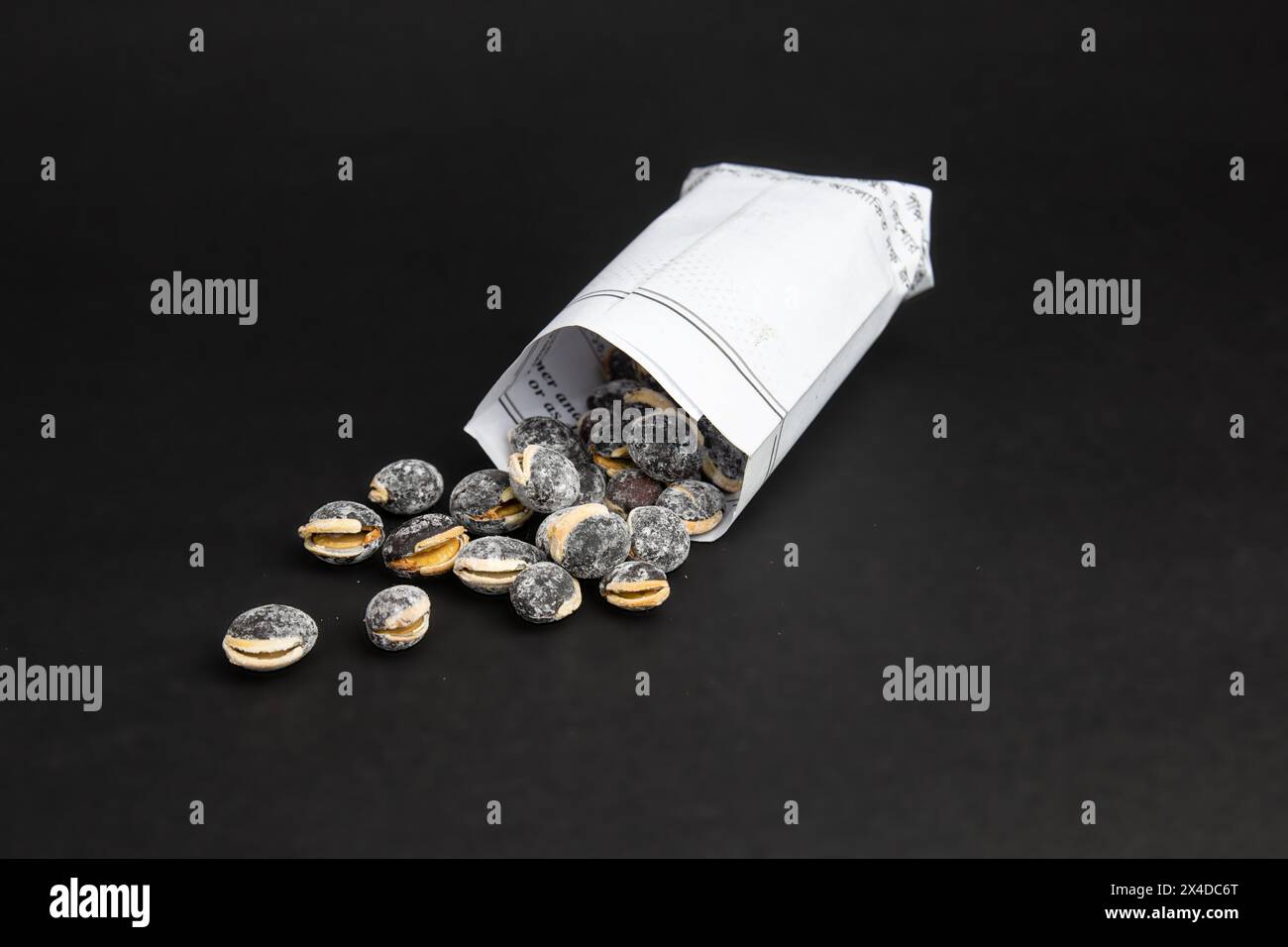 fried beans or sim bichi bhaja in a paper pack or Thonga. popular ...