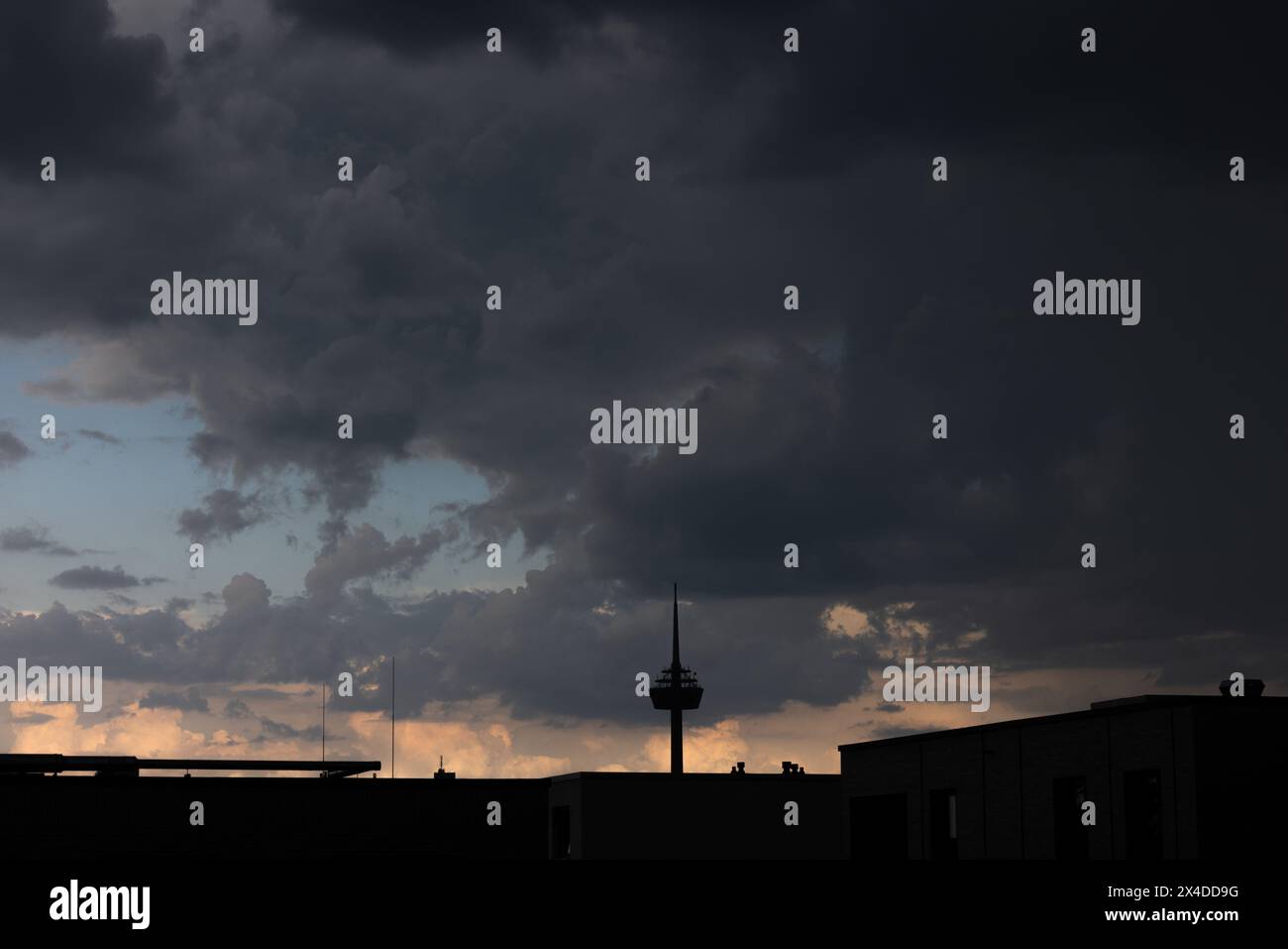 Cologne, Germany. 02nd May, 2024. Dark clouds move over the Colonius ...