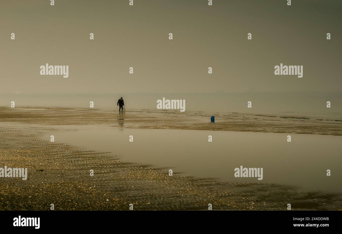 Lonely people on the Adriatic beach Stock Photo - Alamy