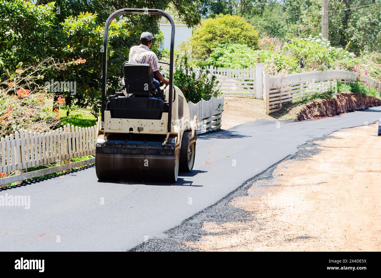 A Road Compactor At Work Stock Photo - Alamy
