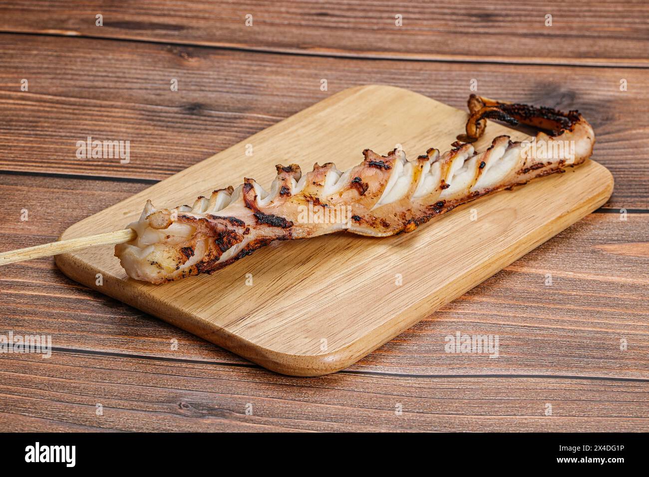 Delicous tasty Grilled octopus tentacle snack Stock Photo - Alamy