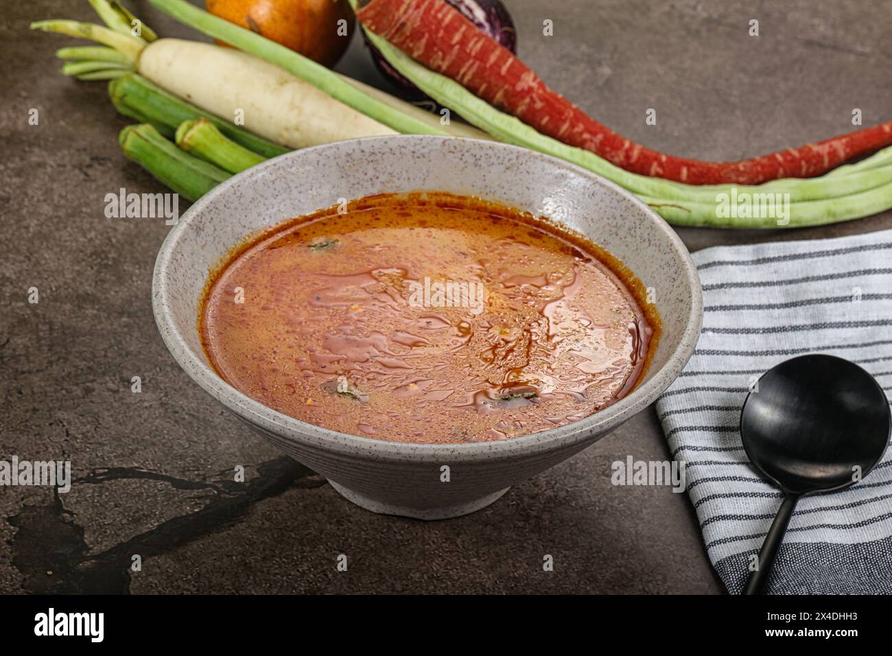 Thai traditional Tom Yum spicy soup Stock Photo - Alamy