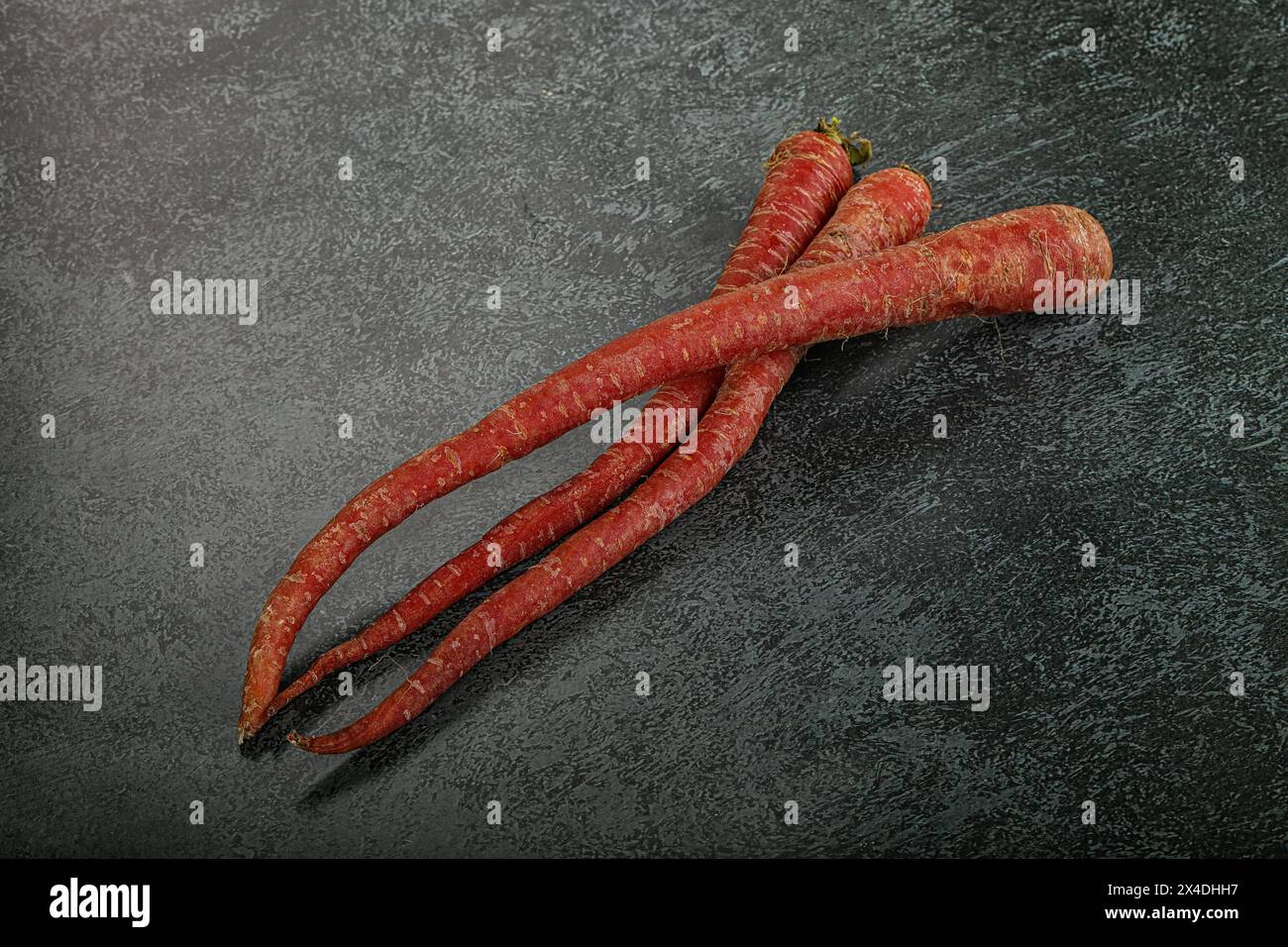 Raw ripe Indian red carrot root Stock Photo - Alamy
