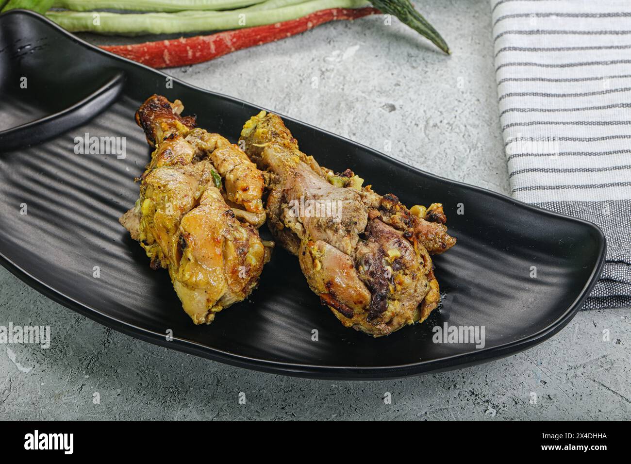 Indian Chicken leg tikka with spices Stock Photo - Alamy