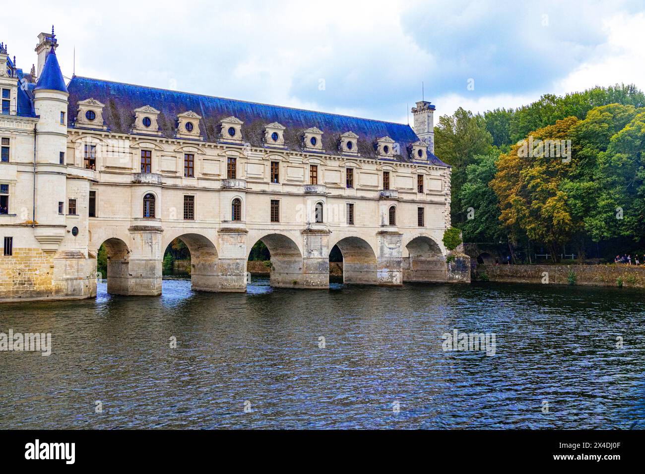 Chateau Chenonceau with the bridge built over the Cher River by ...