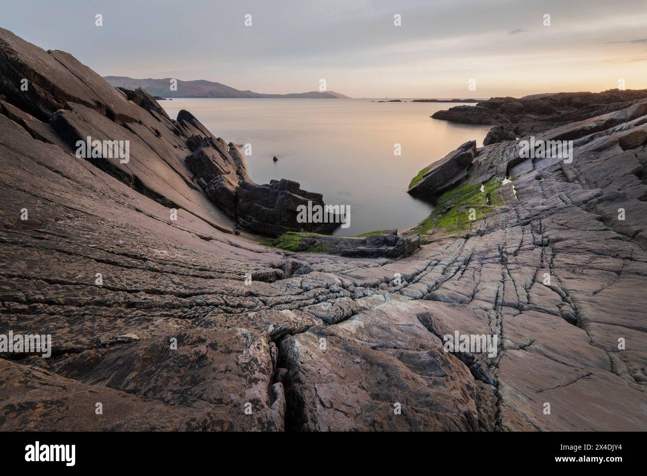Ireland. Landscape with curved rock formation and lake Stock Photo - Alamy