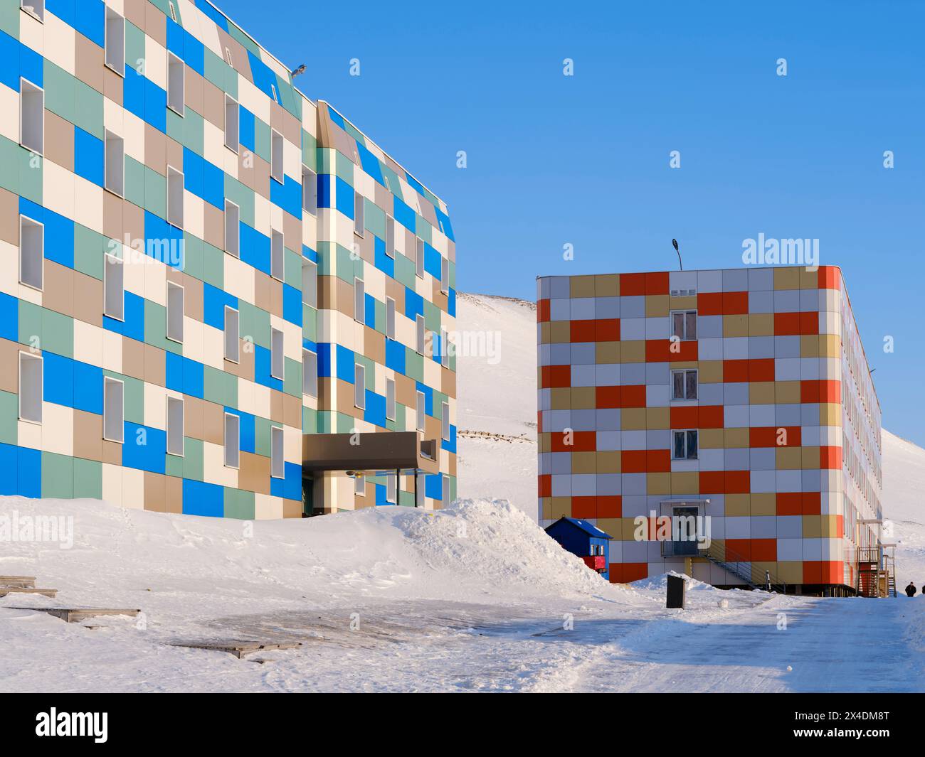 Residential area for the miners. Russian coal mining town Barentsburg ...