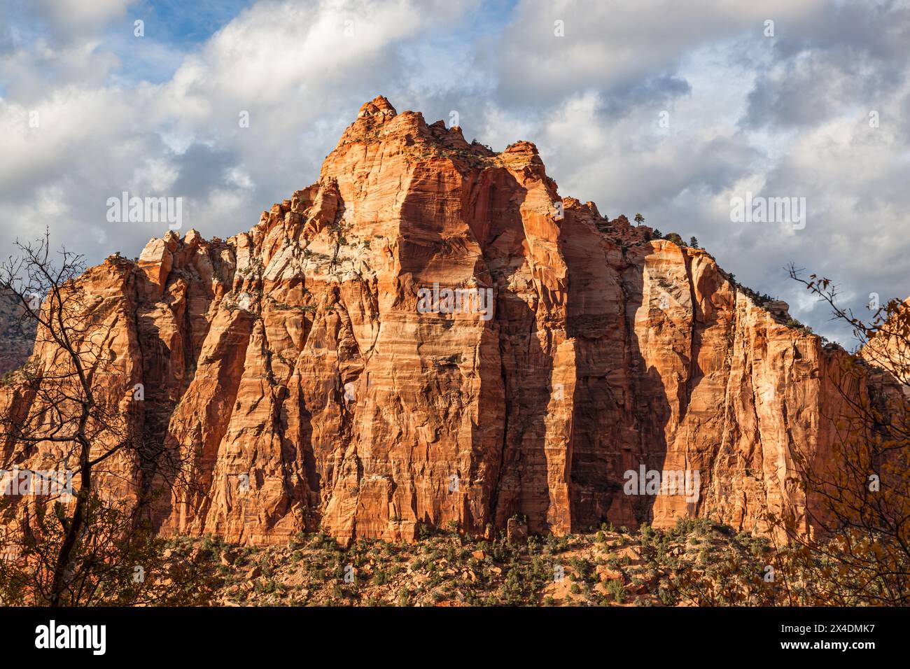 Dramatic ancient sediment mountains carved by wind and rain with ...
