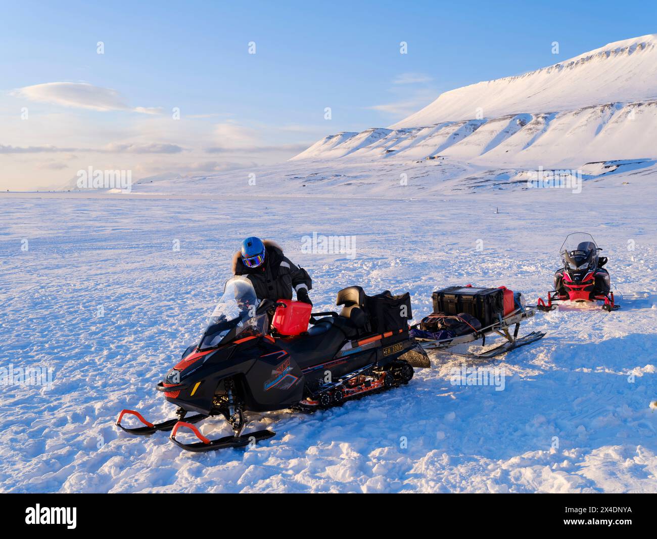 Refueling of snowmobiles. Landscape in Gronfjorden, Island of ...