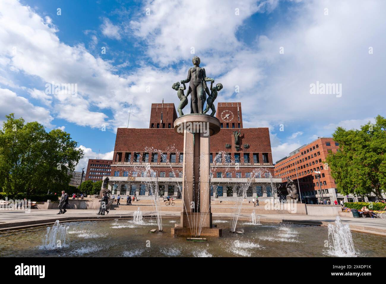 A statue and fountain in Radhuspladsen square fronting Oslo City Hall ...
