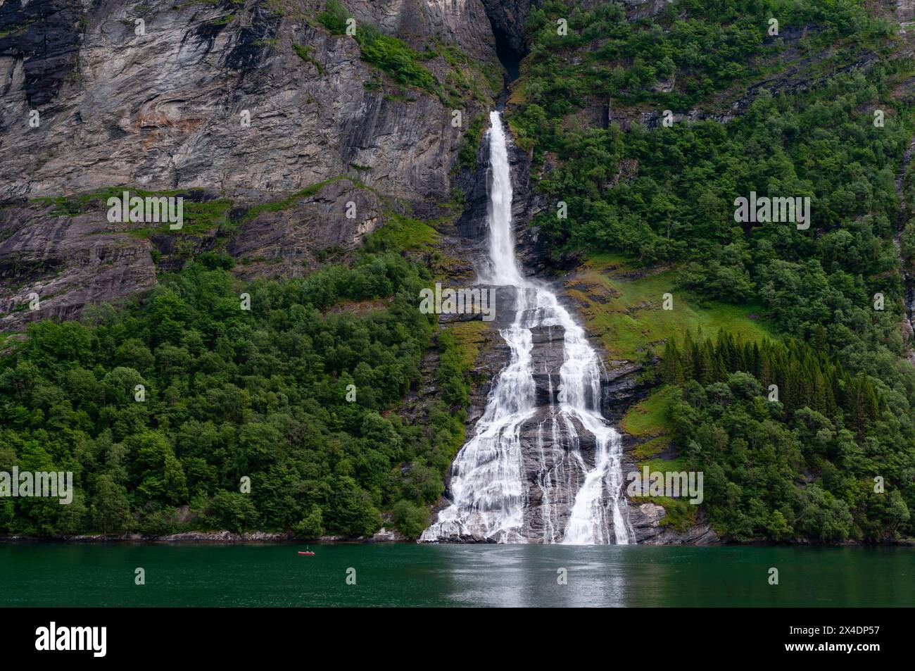 The Seven Sisters waterfalls plunges over steep rugged cliffs into ...