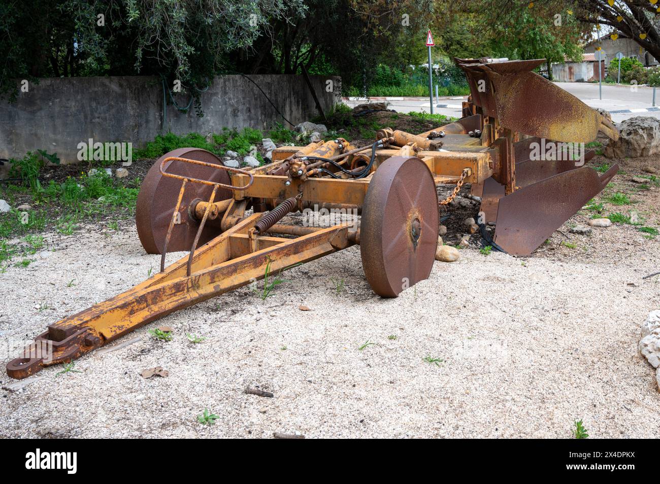 Old rusty agricultural machinery left in a field in Bethlehem of ...