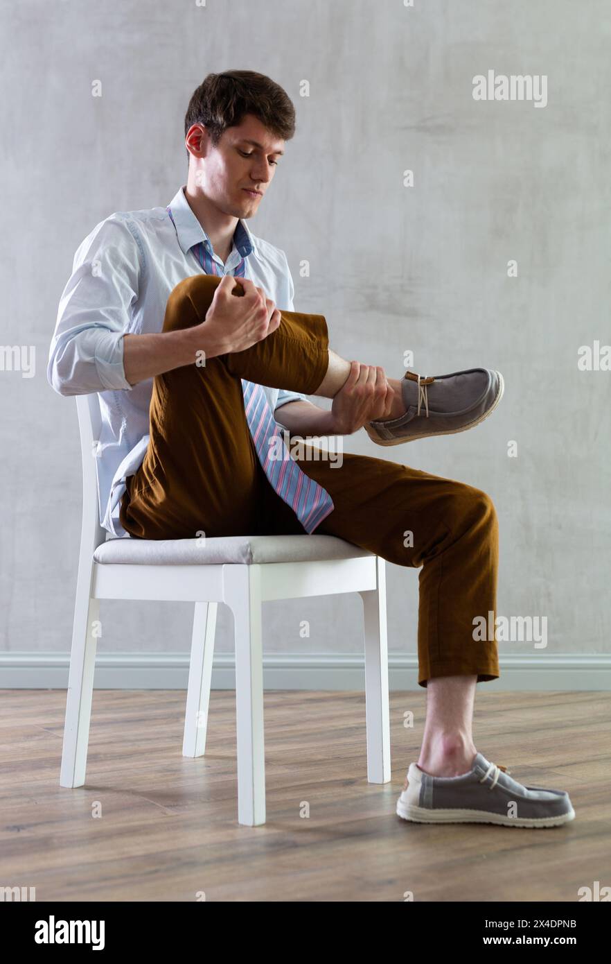 Physical jerks for office workers on chair Stock Photo - Alamy
