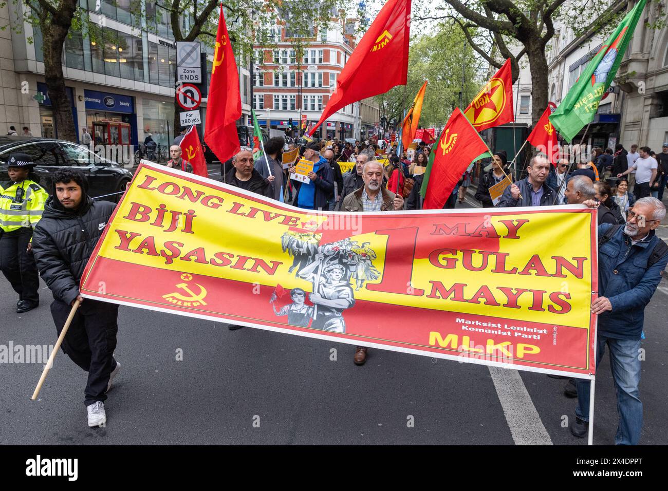 London, UK. 1st May, 2024. Supporters of the Turkish Marxist–Leninist ...