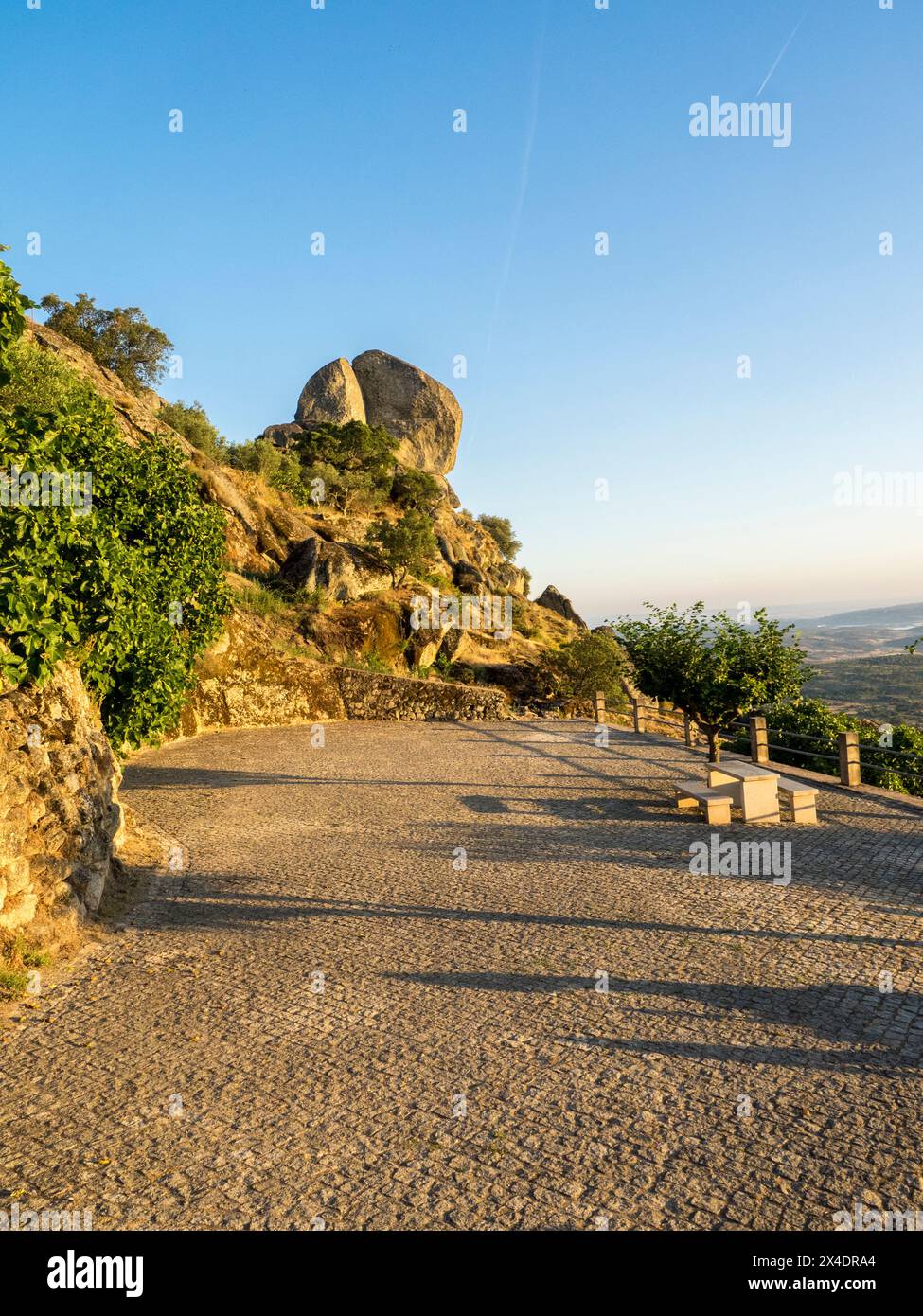 Paved lookout with large boulders above in the ancient, medieval ...