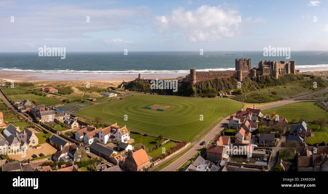 BAMBURGH CASTLE, NORTHUMBERLAND, UK - APRIL 23, 2024. Aerial landscape ...