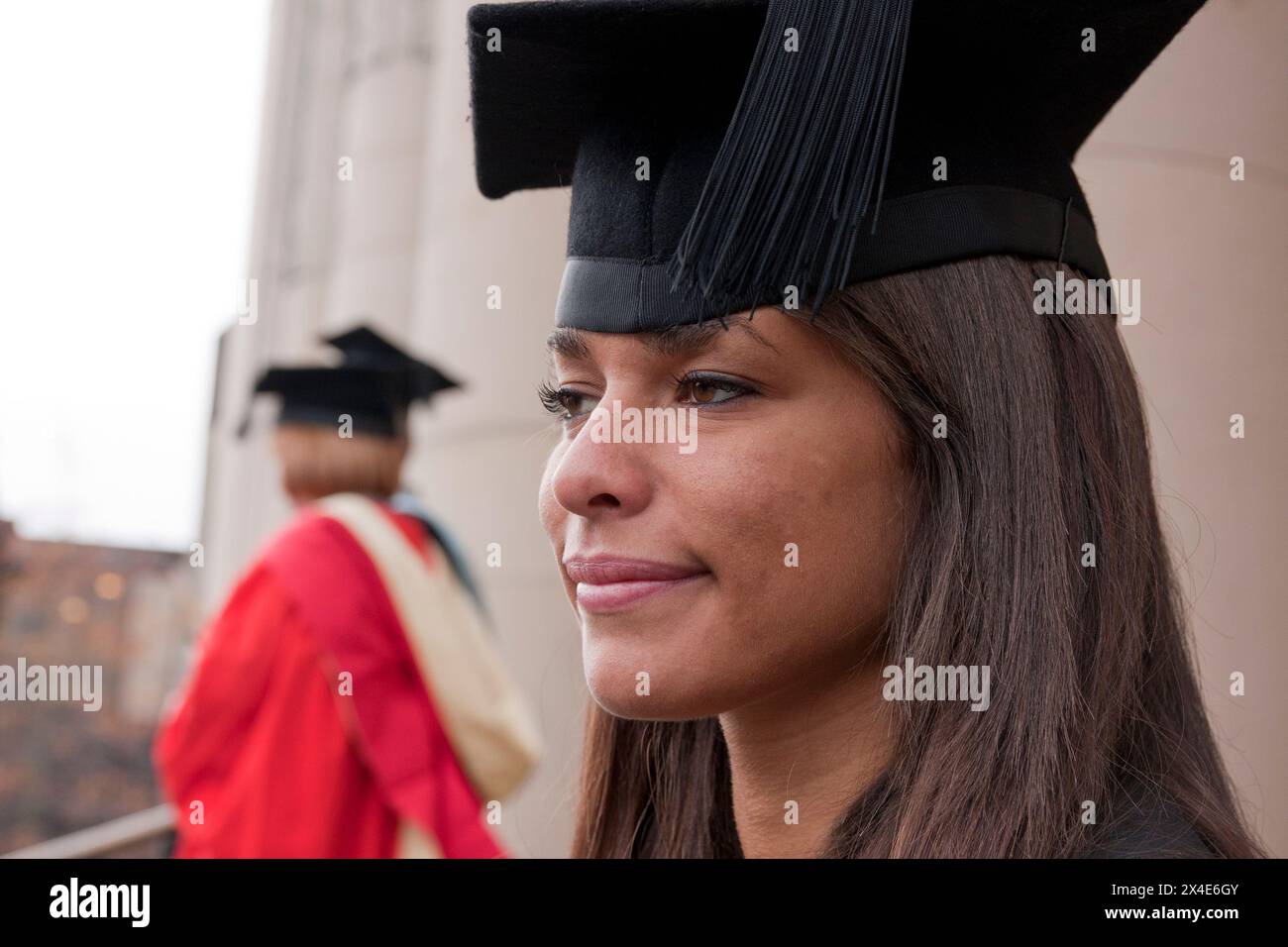 young university student on graduation day in ceremonial regalia Stock ...