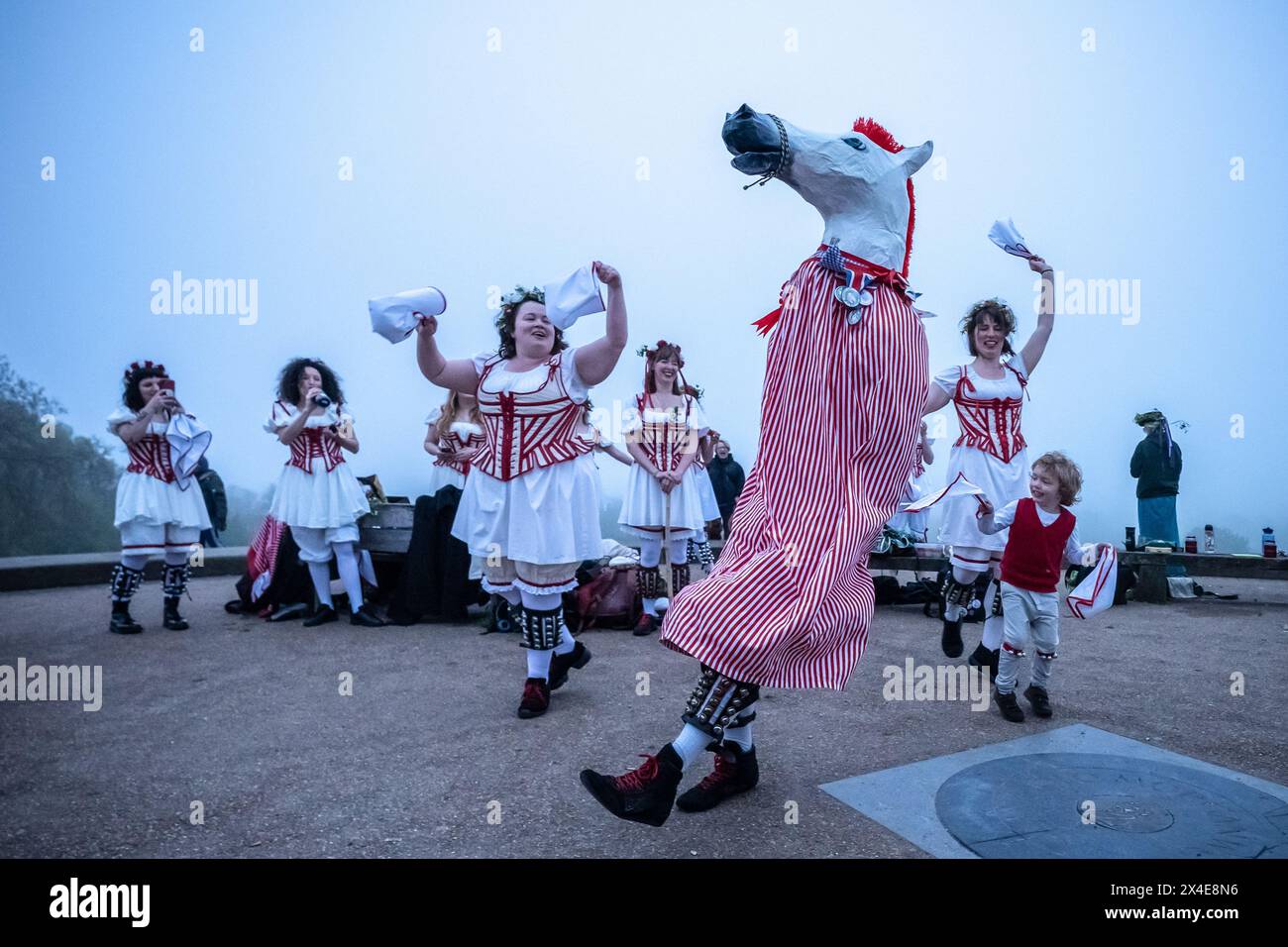 The Belles of London City, female Morris group, perform a May Day dance ...