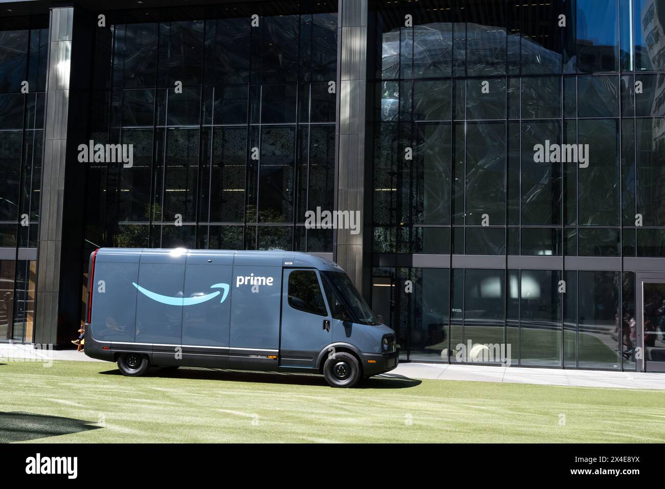 Seattle, USA. 22nd Apr 2024. Amazon Rivian EV delivery vehicle at the ...