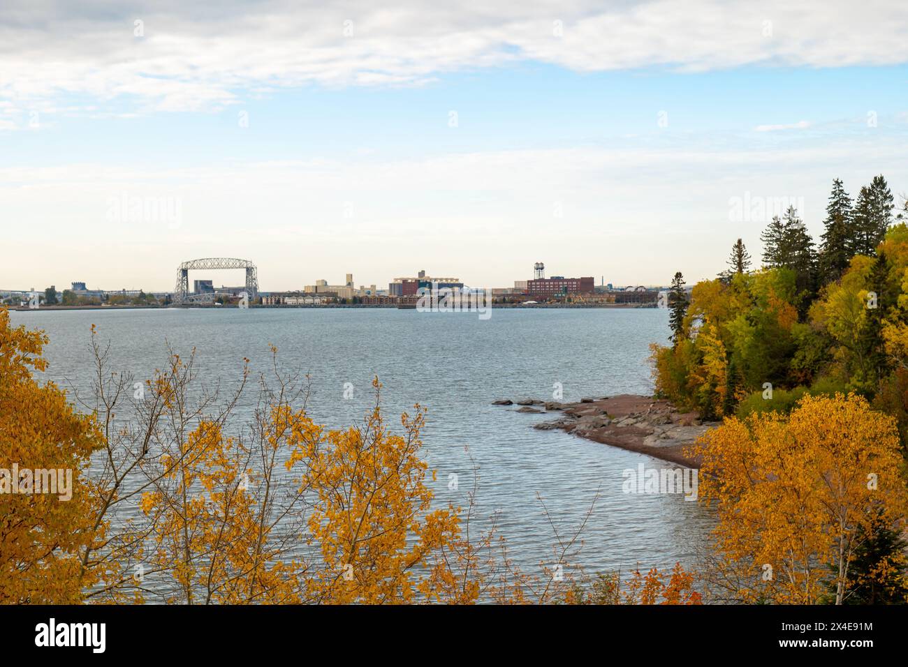 View of iconic Duluth Minnesota Aerial Lift Bridge, water and shore of ...