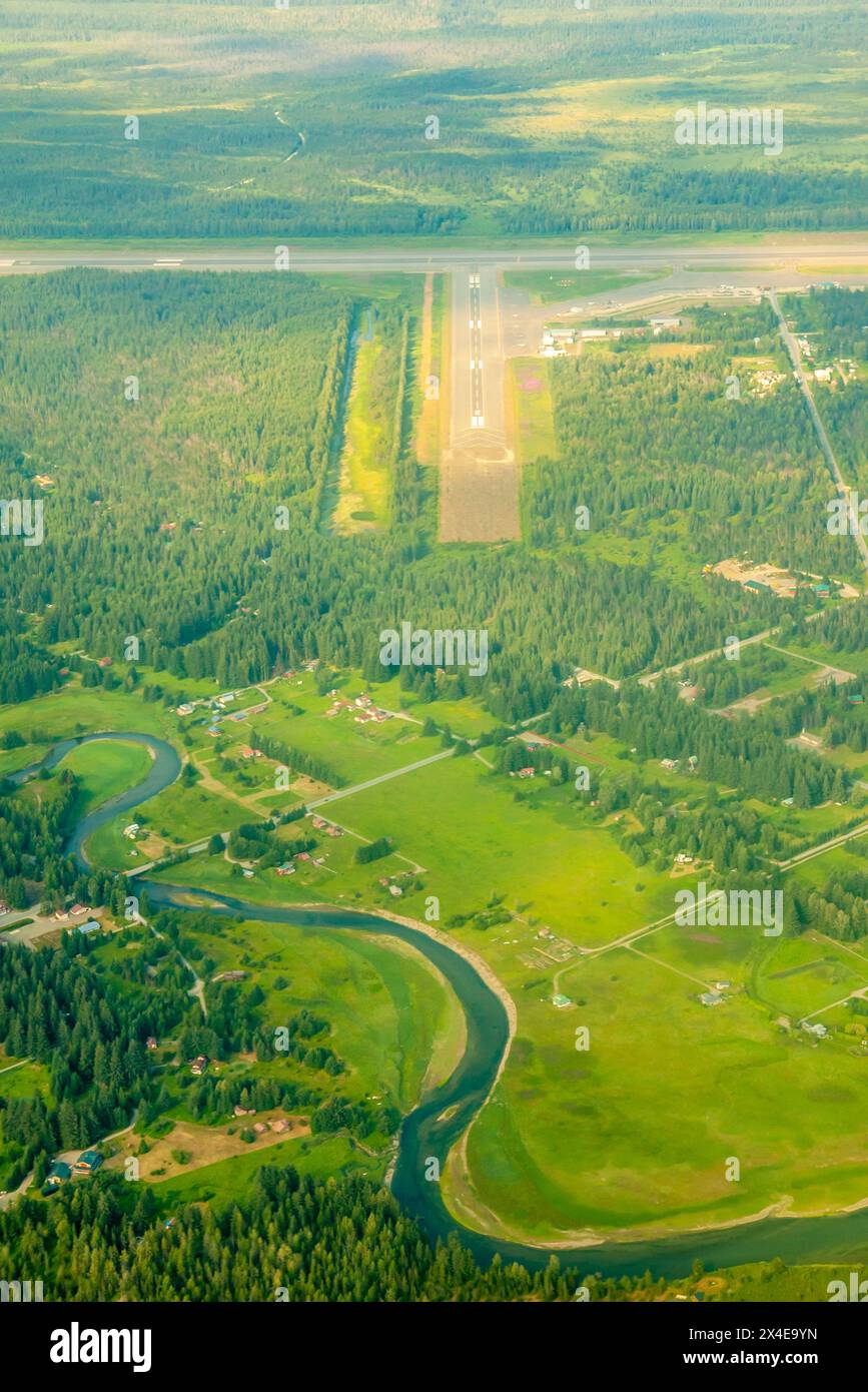 USA, Alaska, Juneau. International Airport runway and Mendenhall River ...