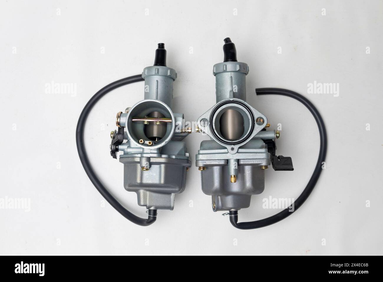 new carburetor for moped isolated on white Stock Photo - Alamy