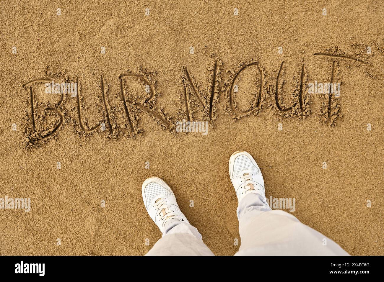 Lido di Jesolo, Italy - 2 May 2024: Burnout, man standing in the sand ...