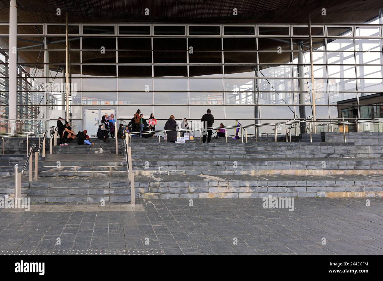 Peaceful protesters outside the Welsh Assembly building, Cardiff Bay ...