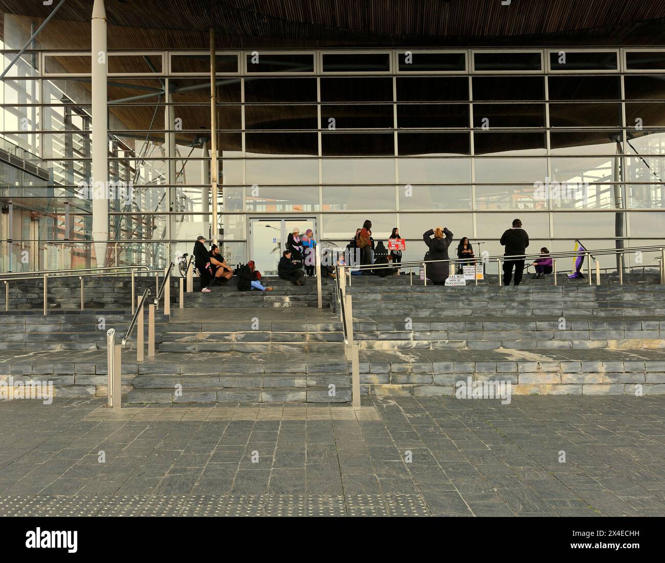 Peaceful protesters outside the Welsh Assembly building, Cardiff Bay ...