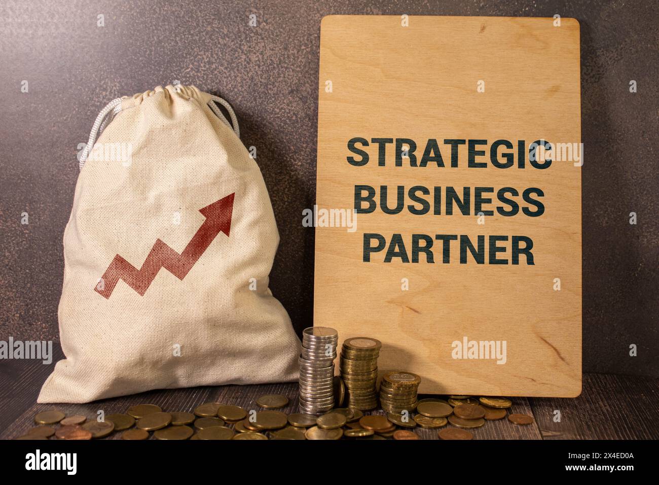 Strategic business partner text on paper on the chart background with ...