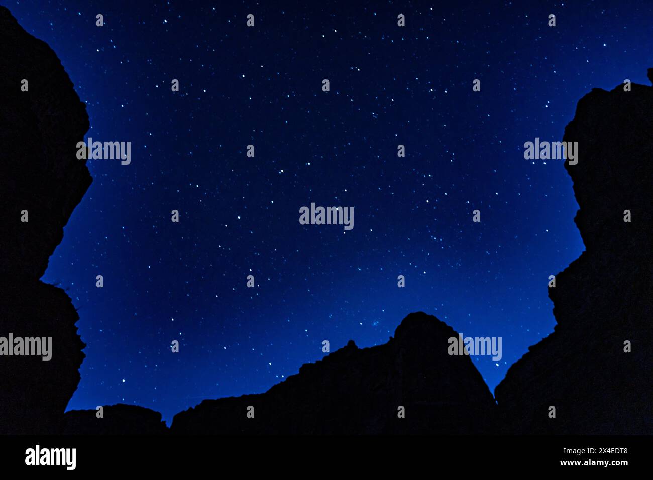 USA, Arizona, Grand Canyon National Park. Canyon cliffs and night sky ...