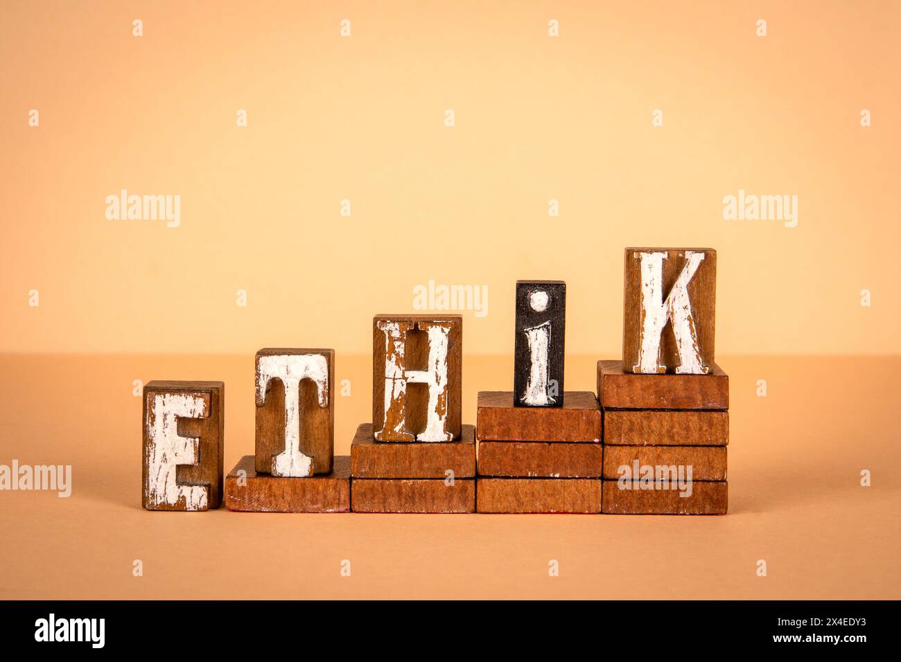 Ethics word in German. Wooden alphabet letters on a light background ...