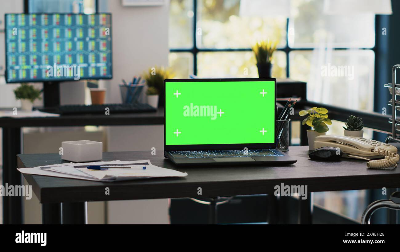 Focus on isolated screen laptop on company desk with computer desktop ...