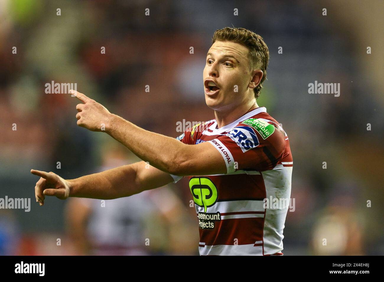 Jai Field of Wigan Warriors gives his team instructions during the ...