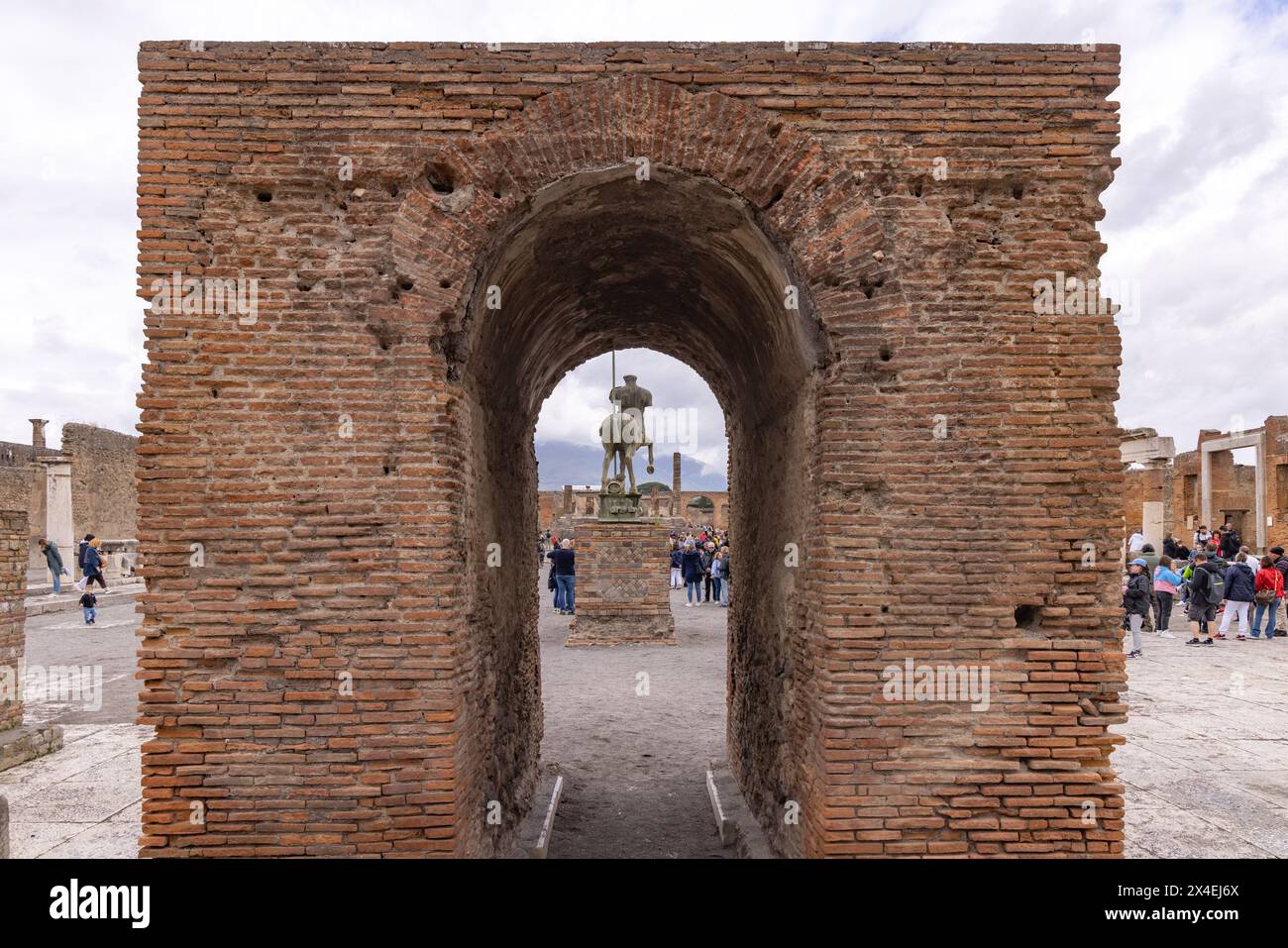 Pompeii forum. The statue of the Centaur seen through the arch of ...