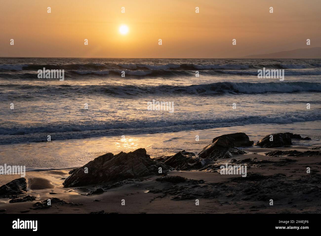 USA, California. Sunset on Jalama Beach County Park rocky beach Stock ...