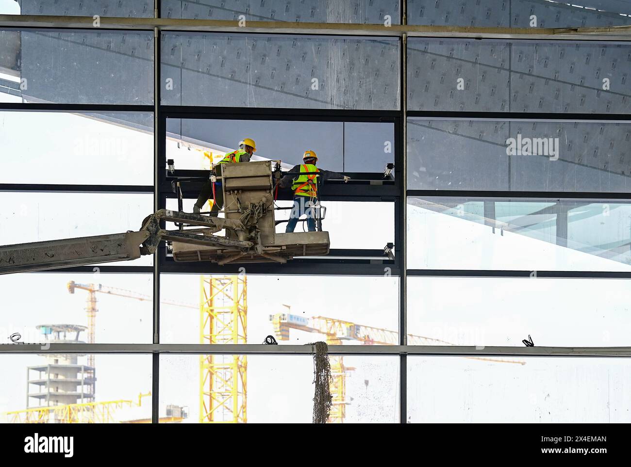 HOHHOT, CHINA - MAY 2, 2024 - Builders work at the construction site of ...