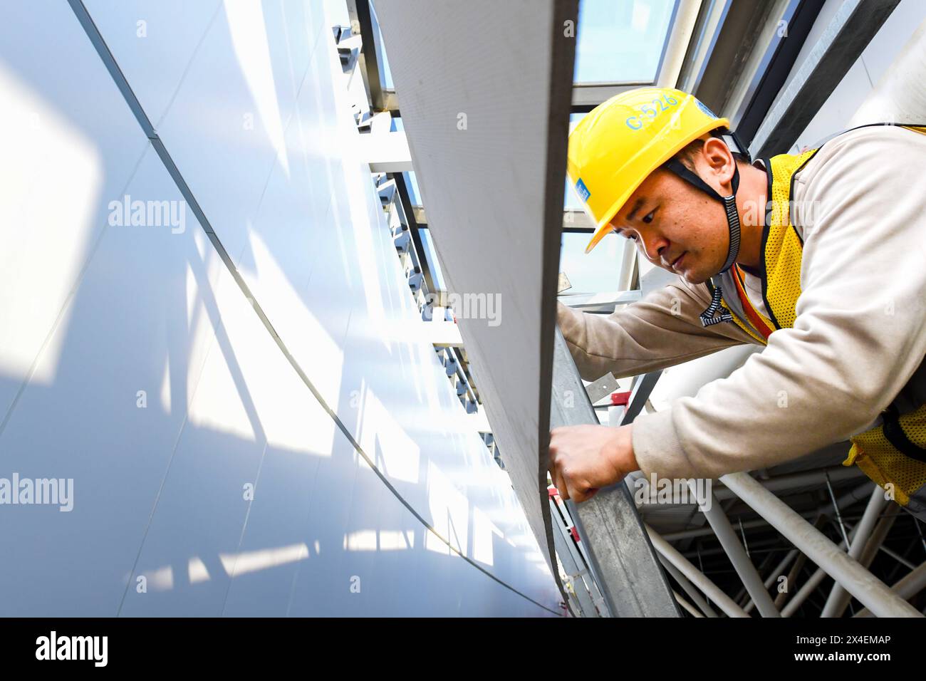HOHHOT, CHINA - MAY 2, 2024 - Builders work at the construction site of ...