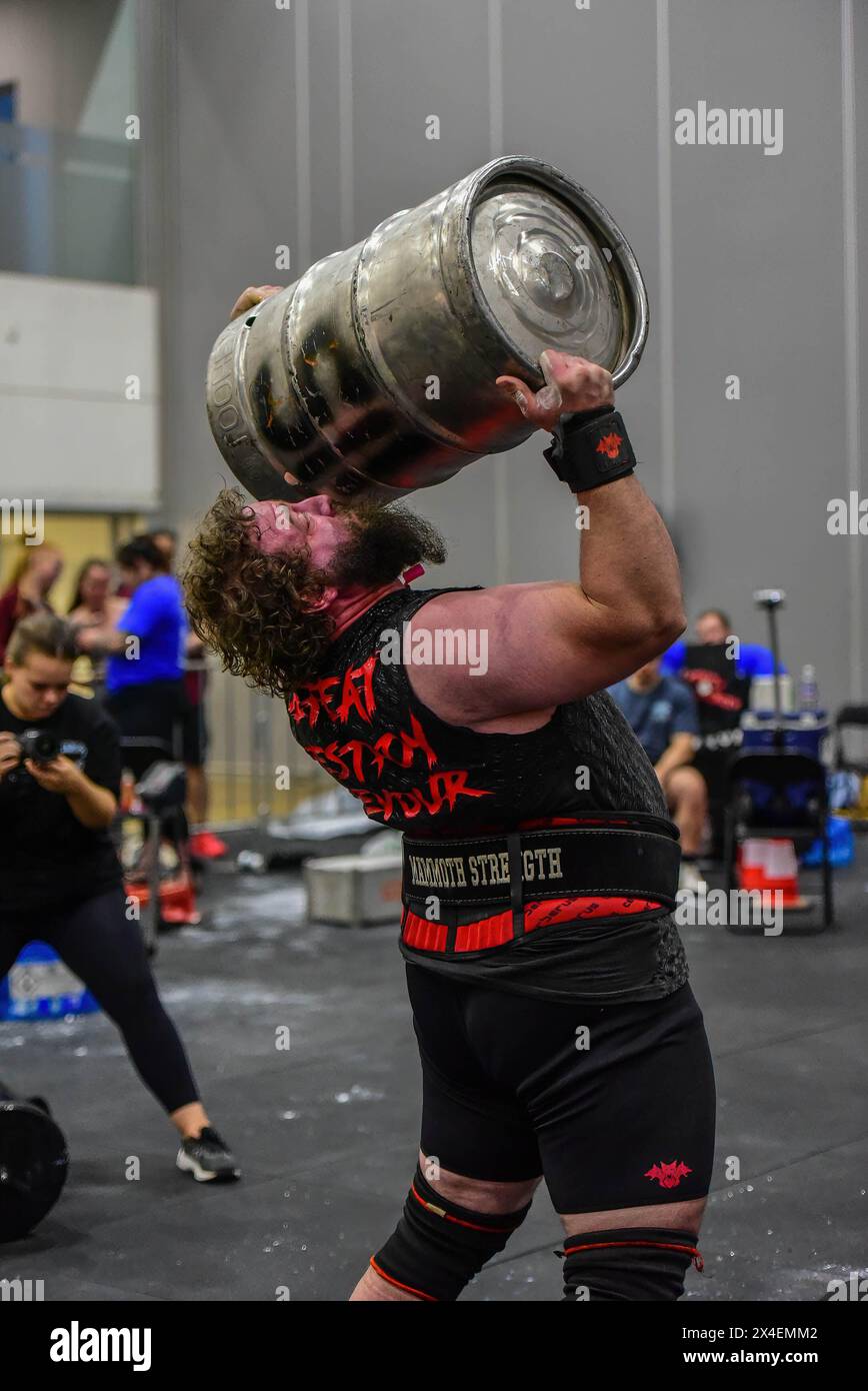 Australian strongman Jesse Lowe is seen in action with keg at 2024 ...