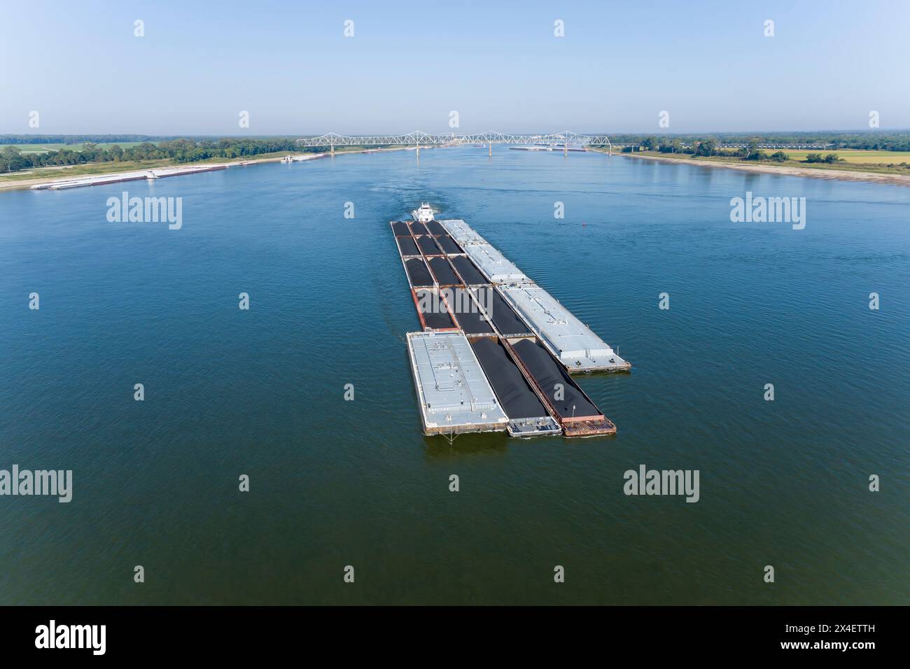 Aerial of barge on the Ohio River near the confluence of the Ohio and ...