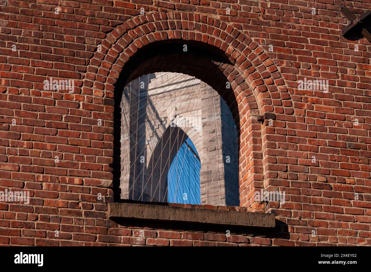The Brooklyn bridge through a window Stock Photo - Alamy