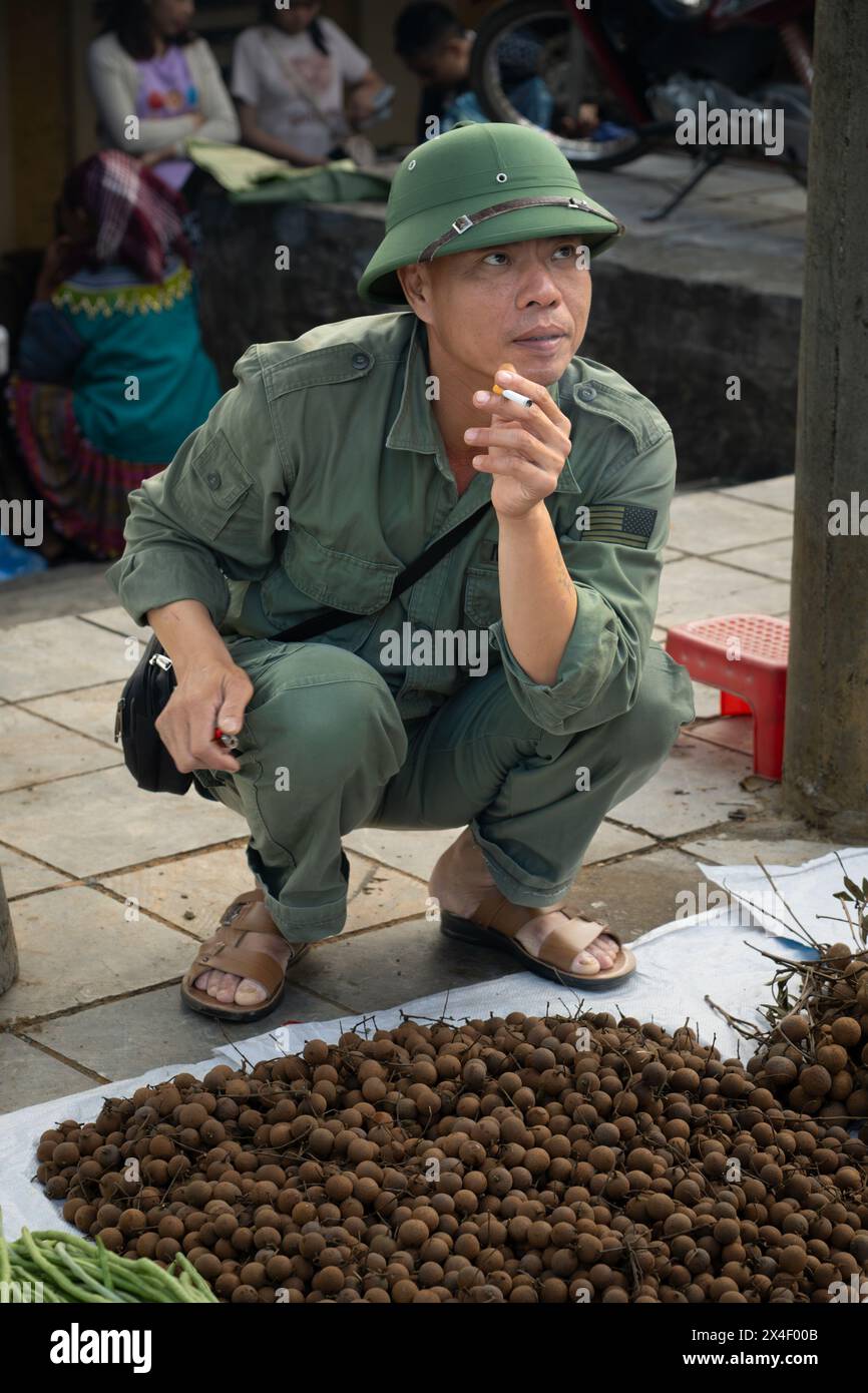 Man selling food at Bac Ha market, Lao Cai Province, Vietnam Stock ...