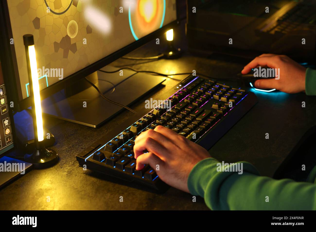 Man playing video games on computer indoors, closeup Stock Photo - Alamy