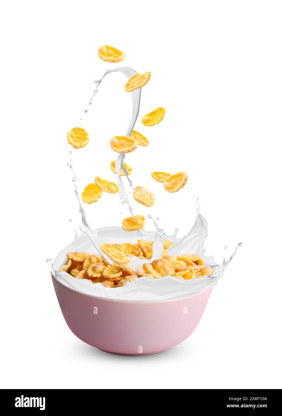 Tasty corn flakes with milk splashing out of bowl isolated on white ...