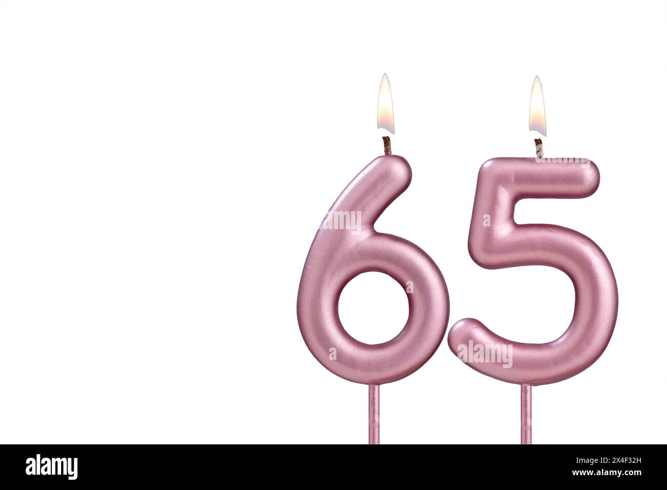 Candle number 65 - Lit birthday candle on white background Stock Photo ...