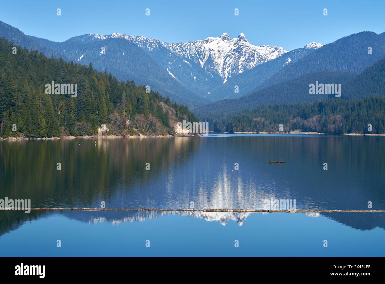 Capilano Lake Lions Peaks Reflection North Vancouver. The view of the ...